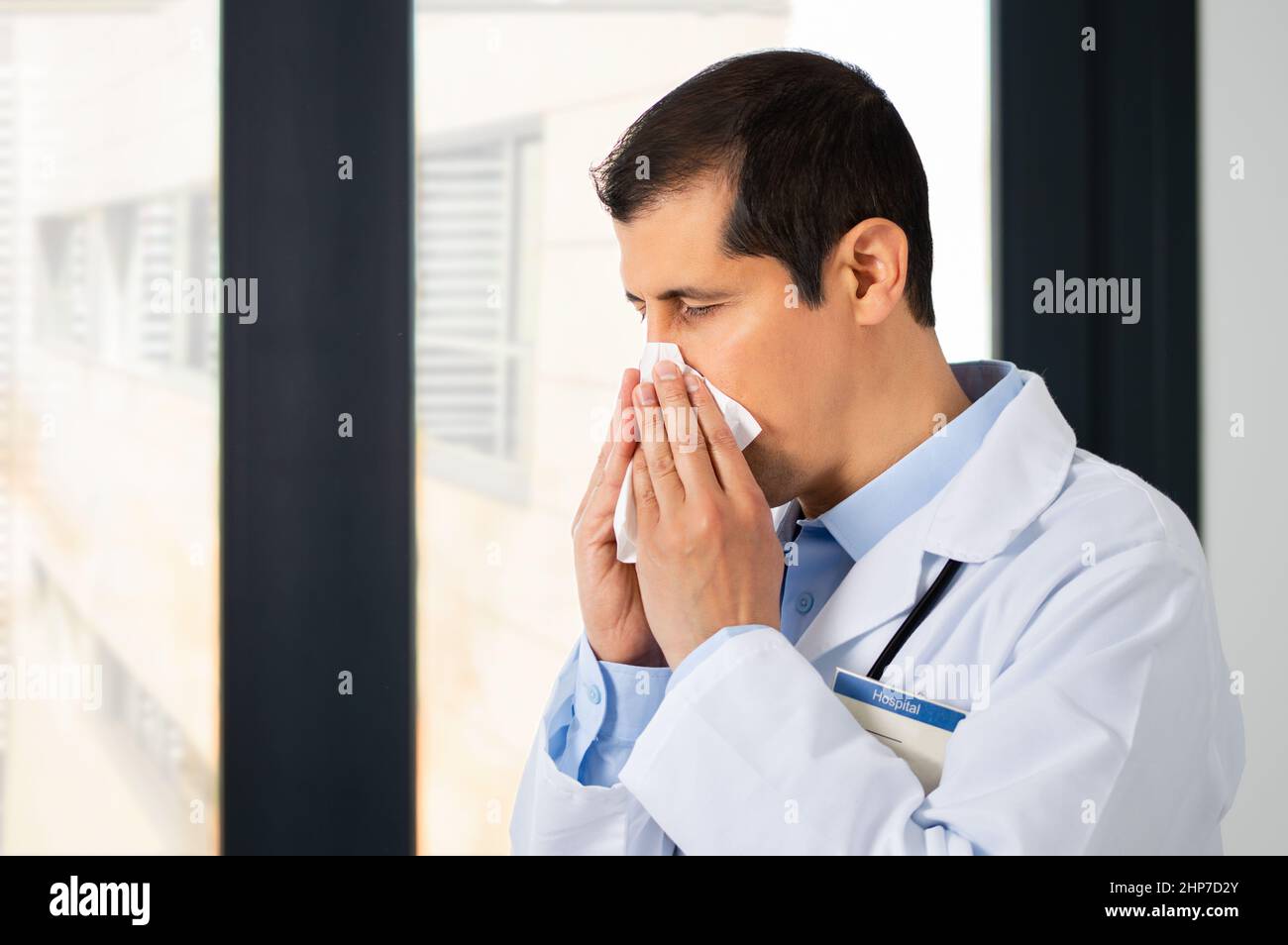 Doctor sneezing hi-res stock photography and images - Alamy