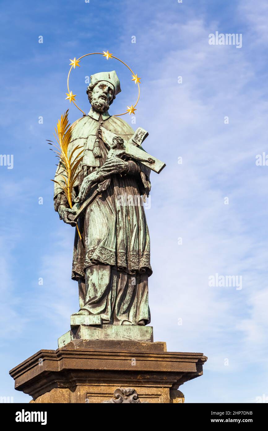 Statue of John of Nepomuk on Charles Bridge in Prague, Czech Republic ...
