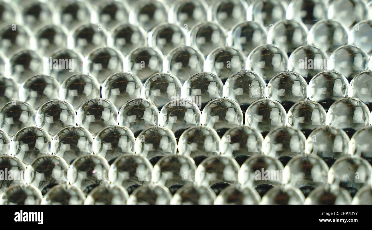 Gel transparent balls. Macro of polymer. Beautiful geometric light ...