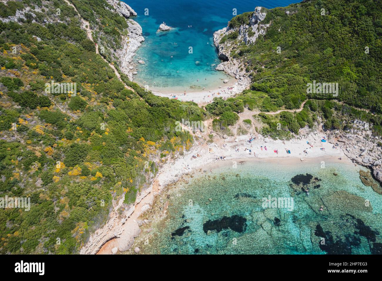 Drone view of Porto Timoni and Limni beach - famous double beach near ...