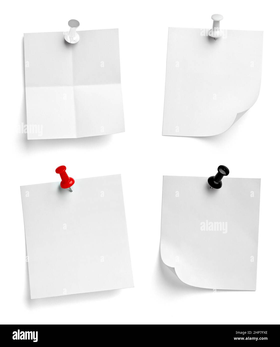 collection of various note paper with a push pin on white background ...
