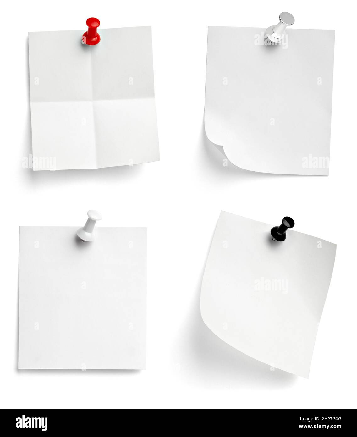 collection of various note paper with a push pin on white background ...