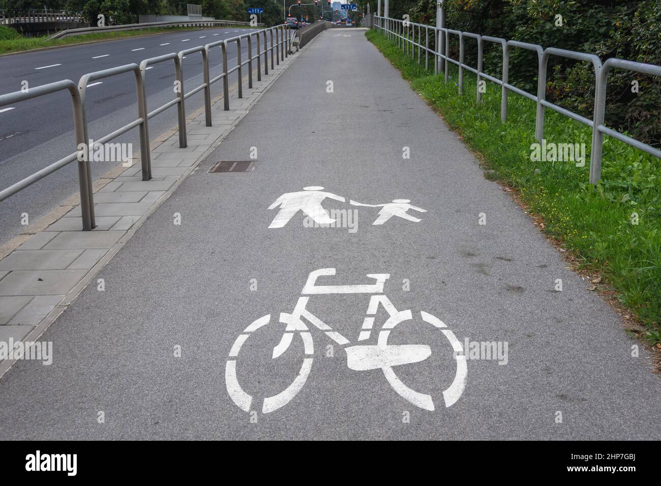 Bicycle path and pedestrian walkway signs in Warsaw, capital of Poland ...