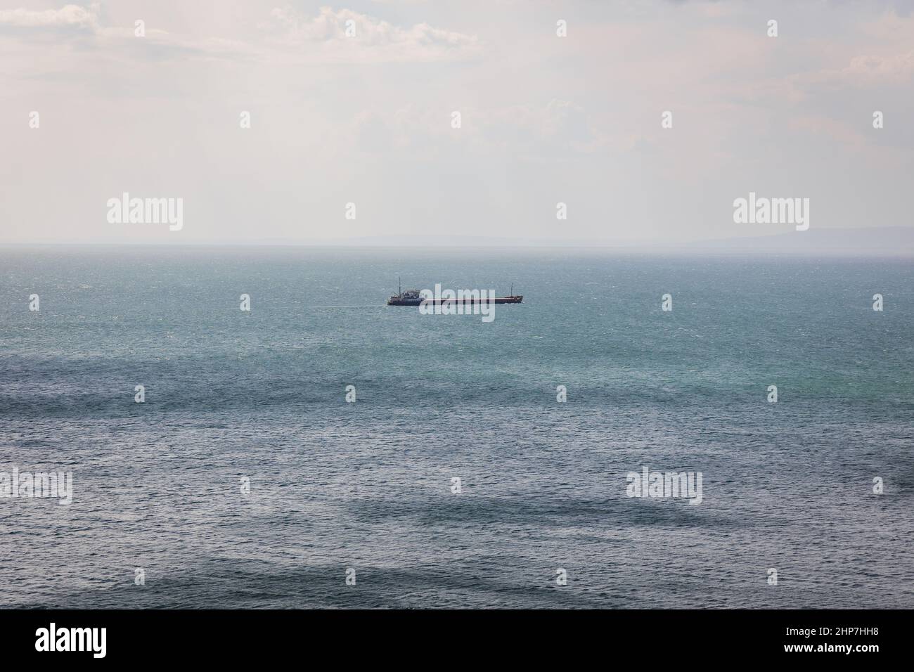 Ship seen from Kaliakra Cape in Southern Dobruja region of the northern ...