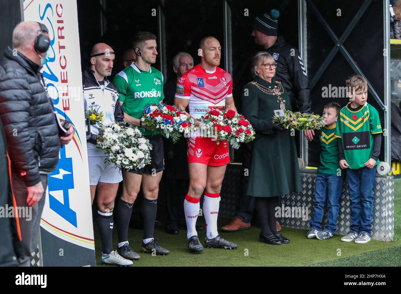 Danny Houghton and James Roby lay a wreath before kick-off, alongside ...