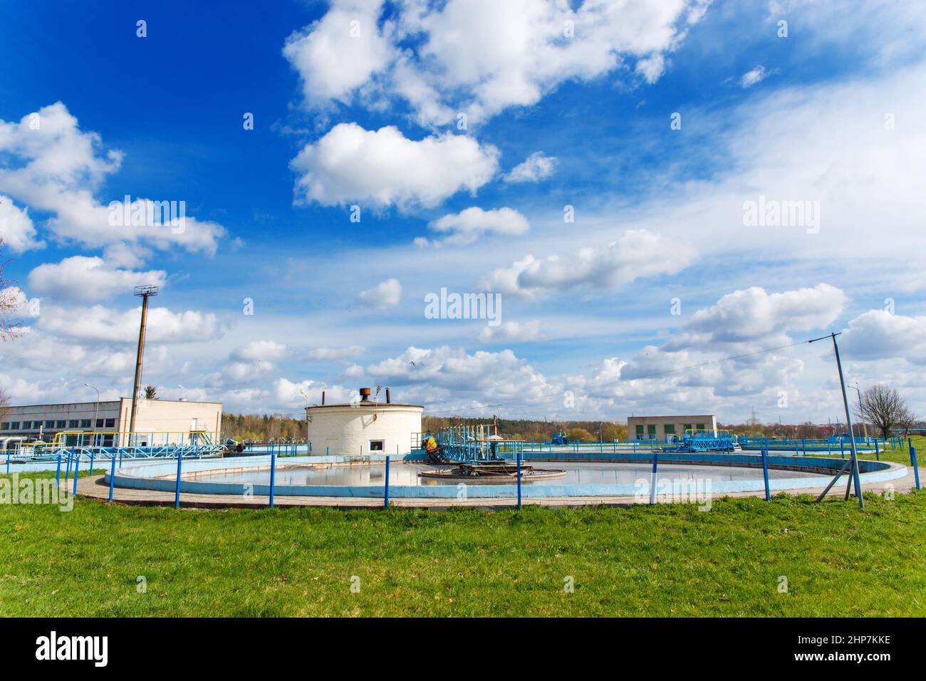 Water overflowing from round settlers on industrial sewage treatment ...