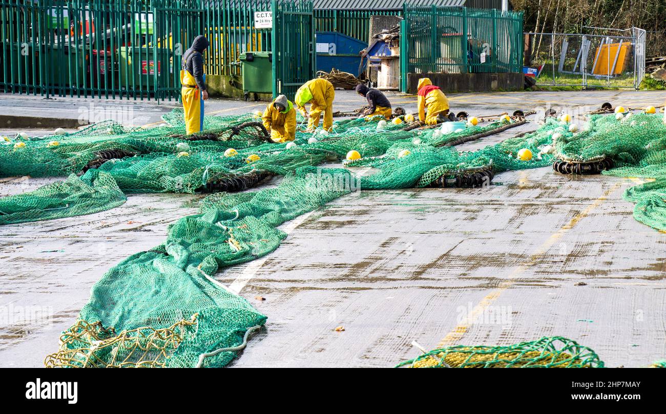 Fishermen making up nets hi-res stock photography and images - Alamy