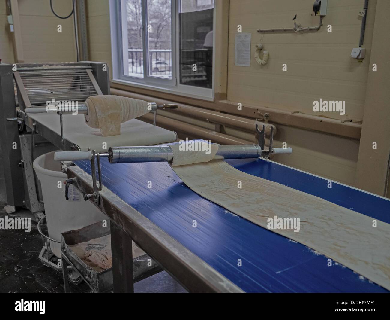 Production line for dough production at the bakery Stock Photo - Alamy