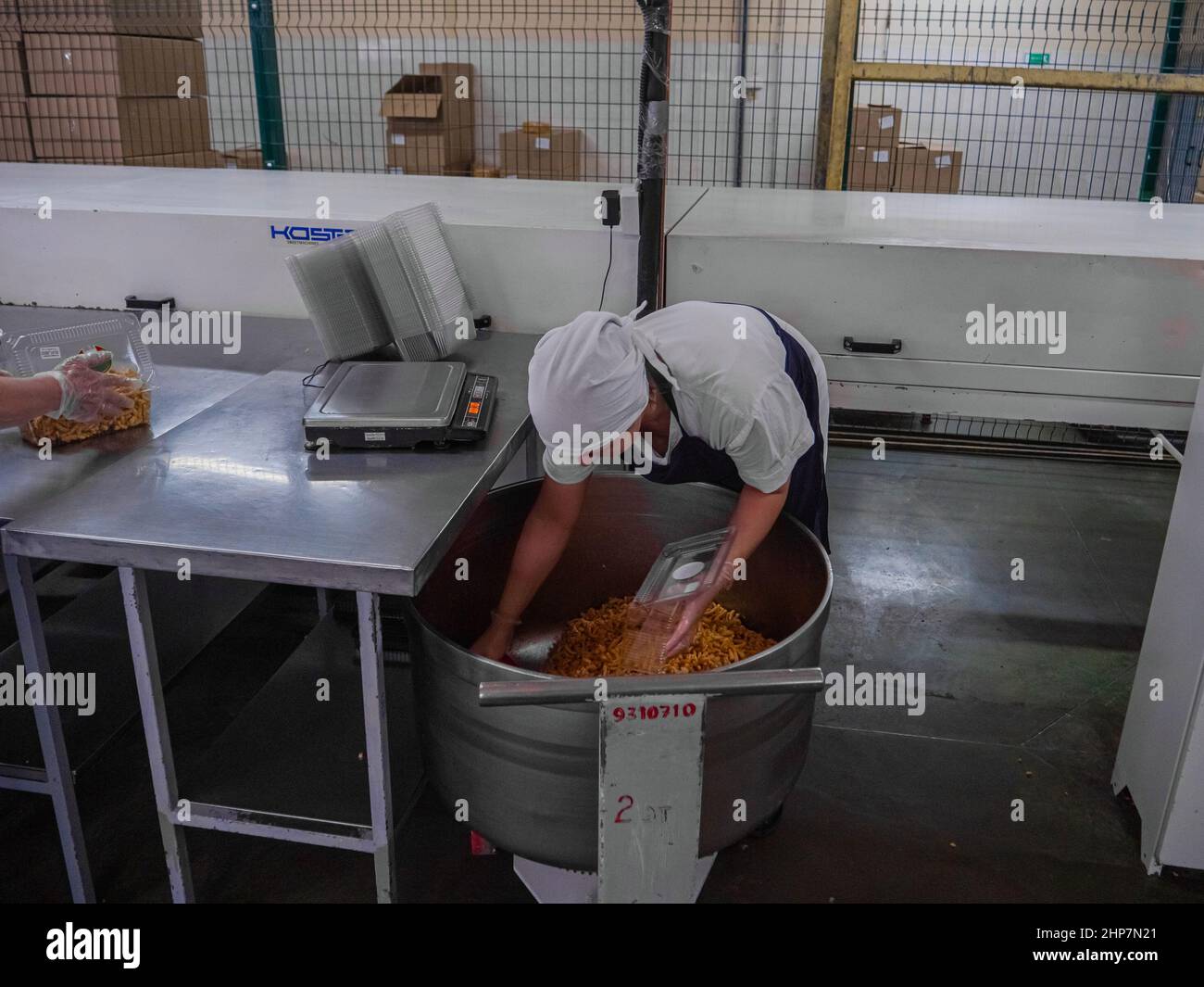 Kazan, Russia. February 02, 2022. Bakery worker on the production line ...