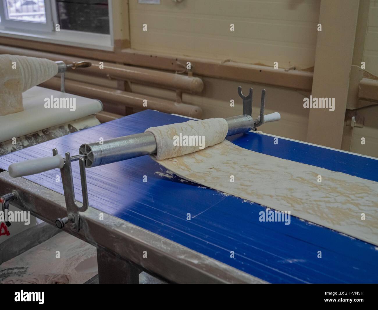 Production line for dough production at the bakery Stock Photo - Alamy