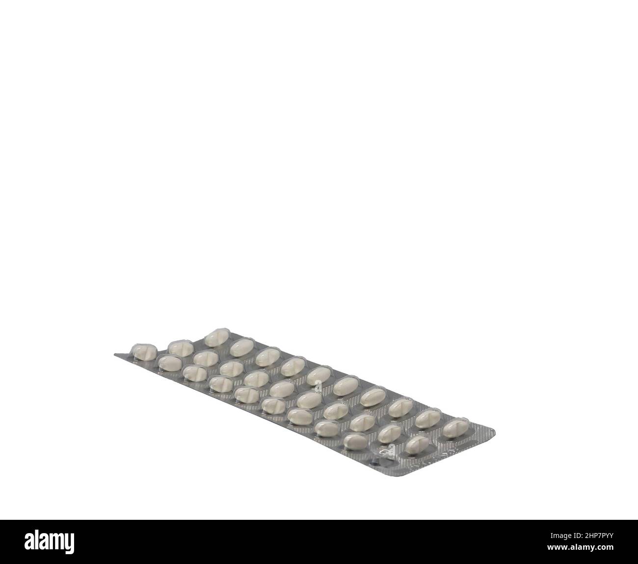 Blister in which there are small pills. One tablet is missing. The ...