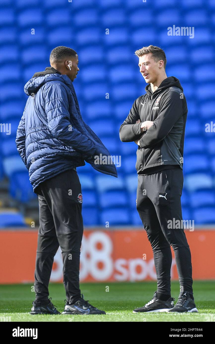 Cardiff, UK. 19th Feb, 2022. Stuart Moore #13 of Blackpool and Marvin ...