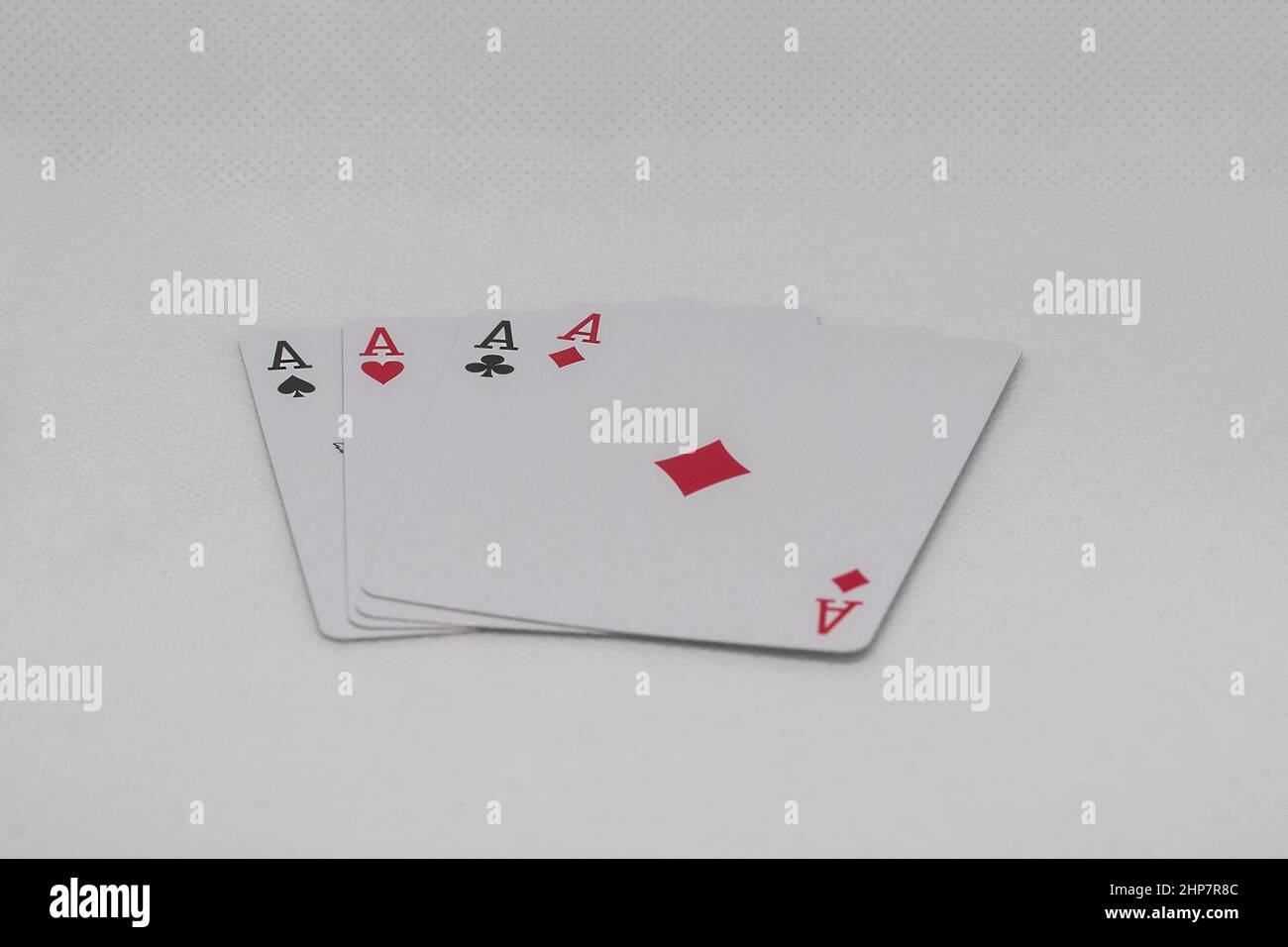 Four aces poker cards stacked side by side Stock Photo - Alamy