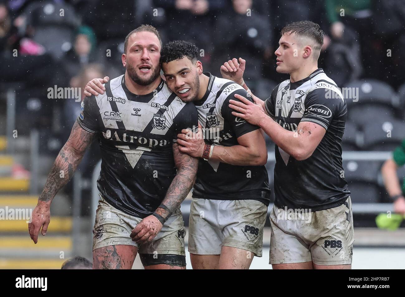 Josh Griffin #4 of Hull FC celebrates his try with Cameron Scott #24 of ...