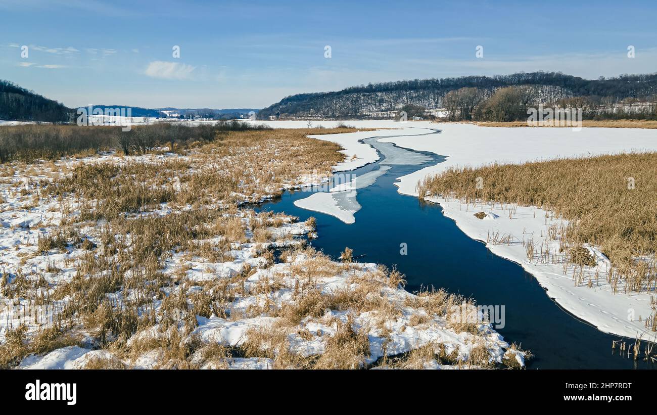 Open water as ice melts from warm sun through the valley Stock Photo ...