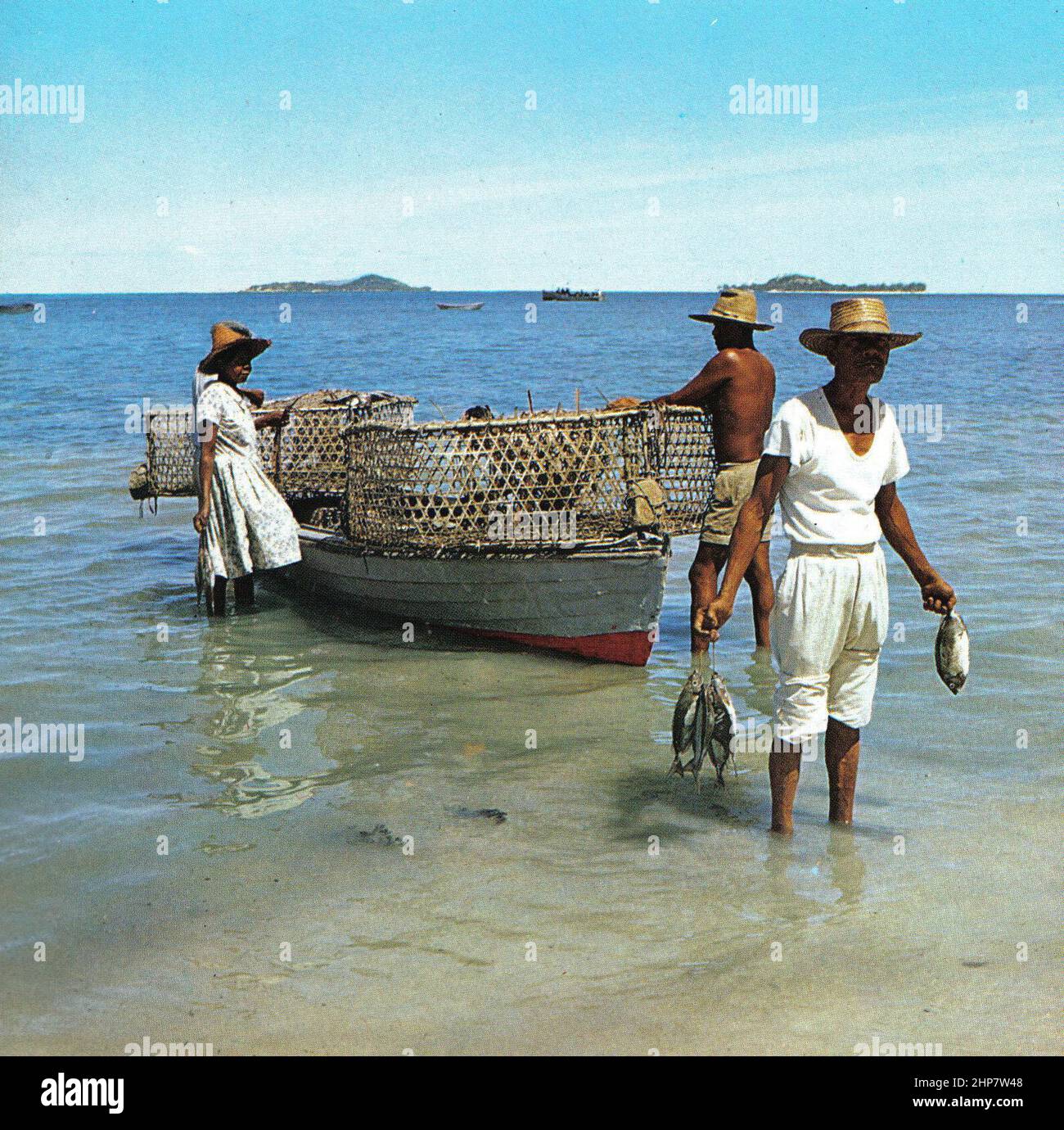 Fisherman landing his catch, Seychelles ca. early 1970s Stock Photo - Alamy Fisherman landing his catch, Seychelles ca. early 1970s Stock Photo - Alamy