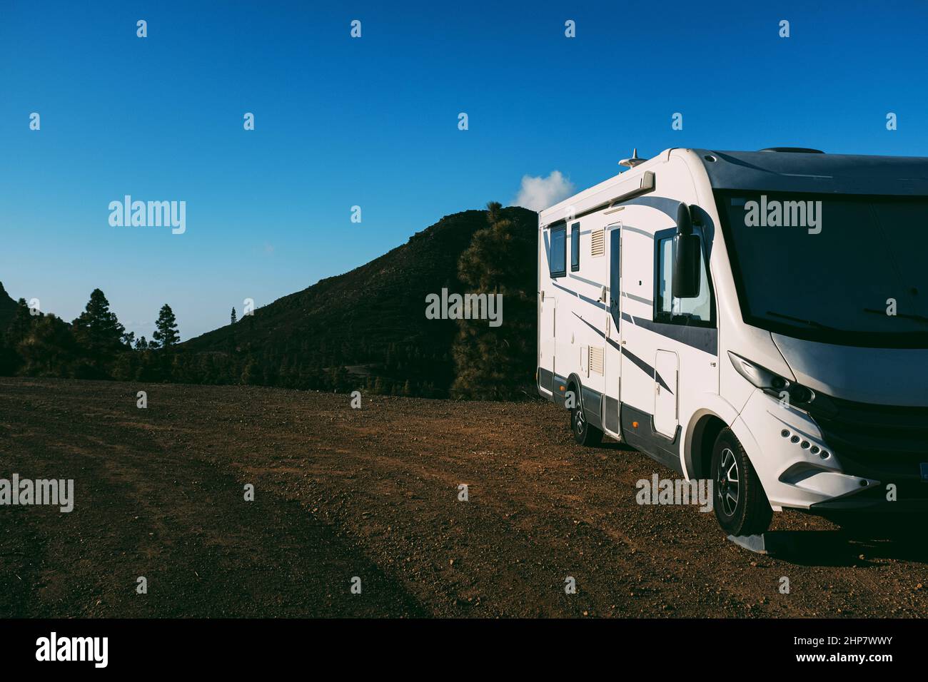 Modern camper van motorhome parked in the nature with sky view. Concept ...