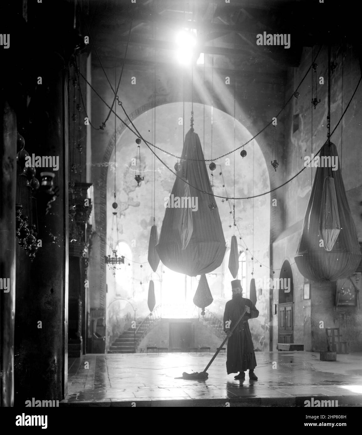 Middle East History: Monk sweeping floor in Church of Nativity in ...