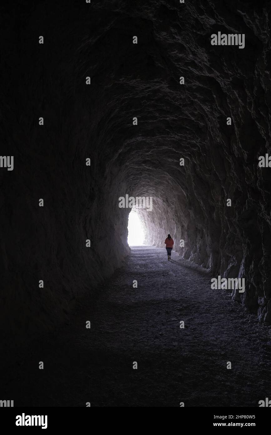 Hiker walking inside cave, landscape and excursion Stock Photo - Alamy