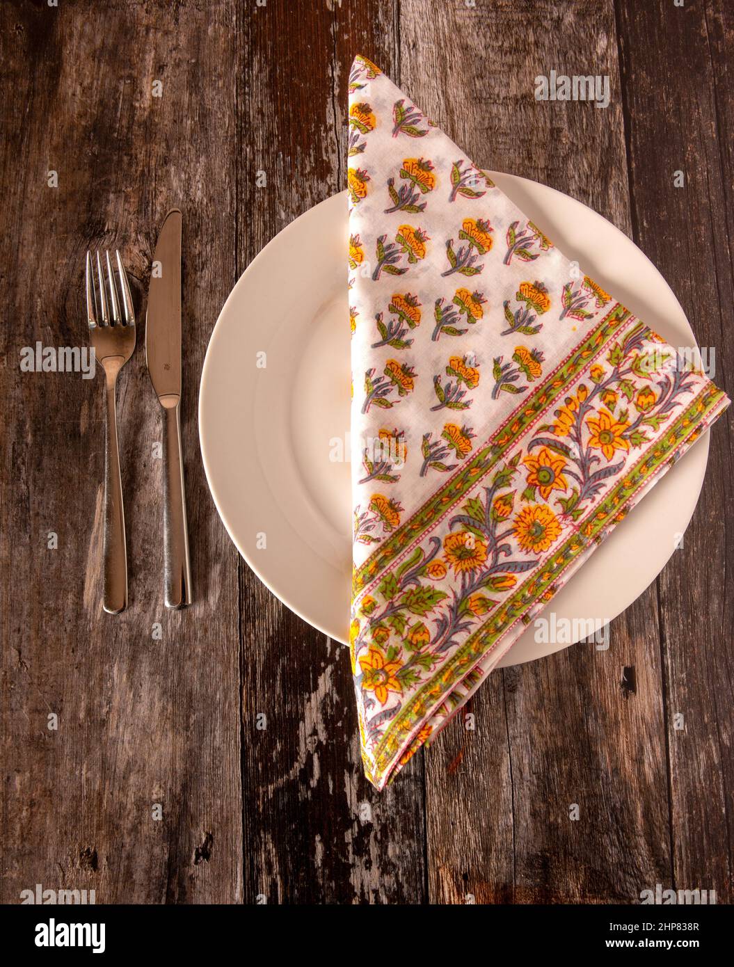 Still life of plate with knife, fork and napkin Stock Photo - Alamy