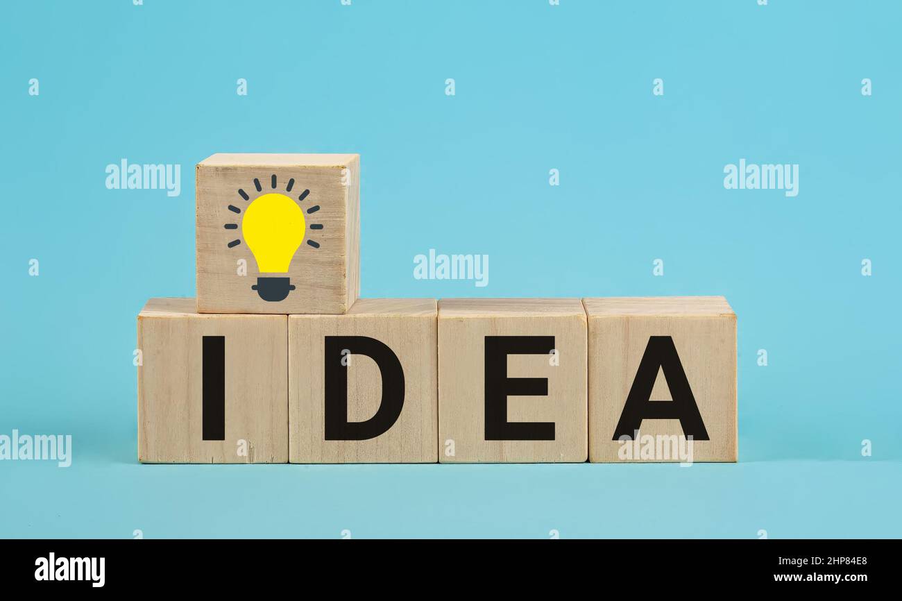 Concept creative idea and innovation. Idea Word on Wooden Tile Block. IDEA Word Concept. Word ...