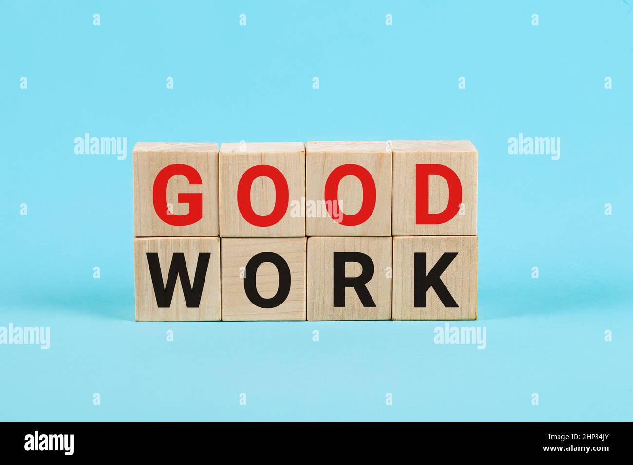 Good work Business Concept. Good work symbol. Wooden cubes word good ...