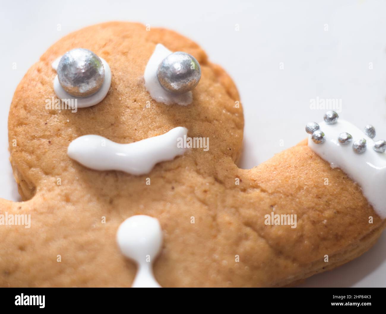 Gingerbread man decorated with white icing hi-res stock photography and ...