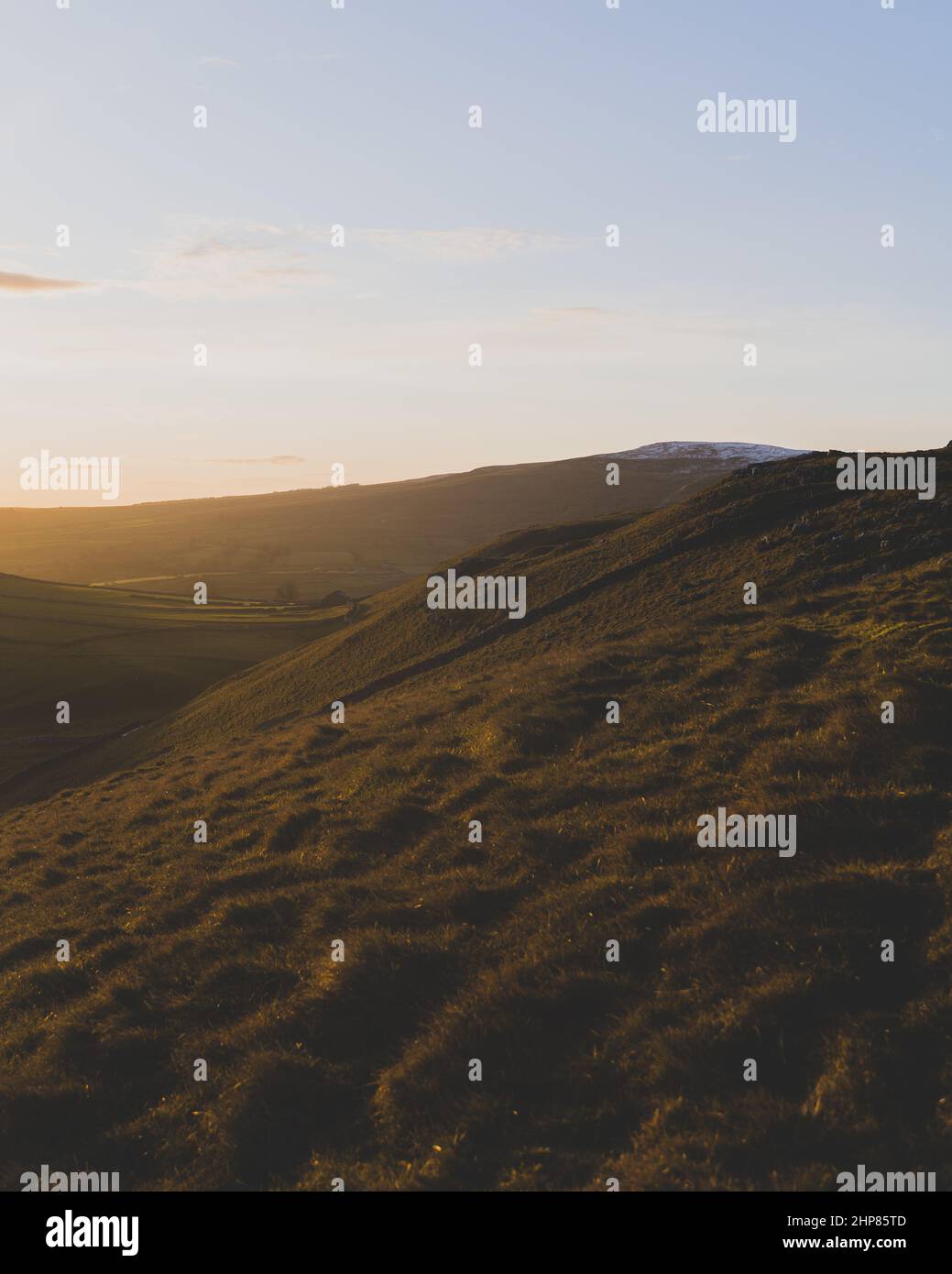 Beautiful landscape of green hills on the sunset Stock Photo - Alamy