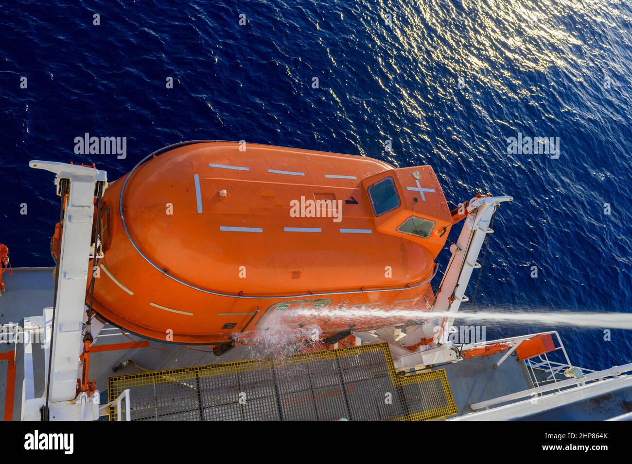 Hose pressure water test of totally enclosed lifeboat. Watertight test ...