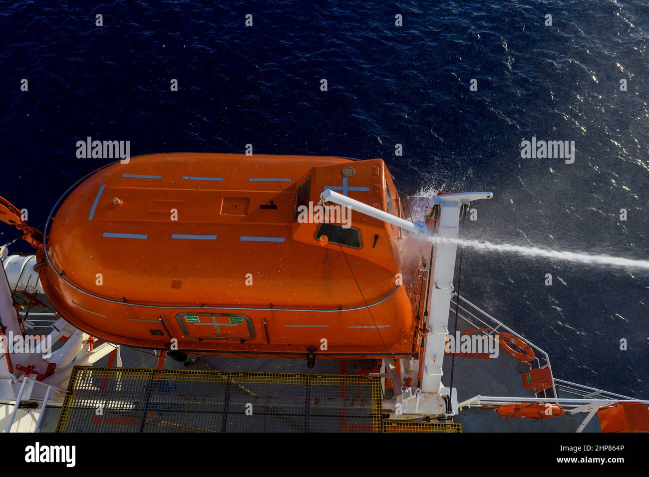Hose pressure water test of totally enclosed lifeboat. Watertight test ...
