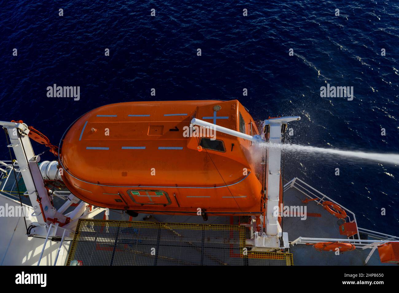 Hose pressure water test of totally enclosed lifeboat. Watertight test ...