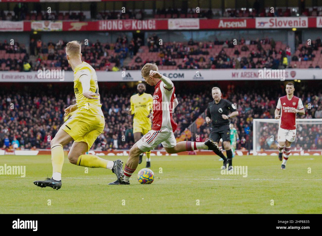 Emile Smith Rowe #10 of Arsenal scores the opening goal in London ...