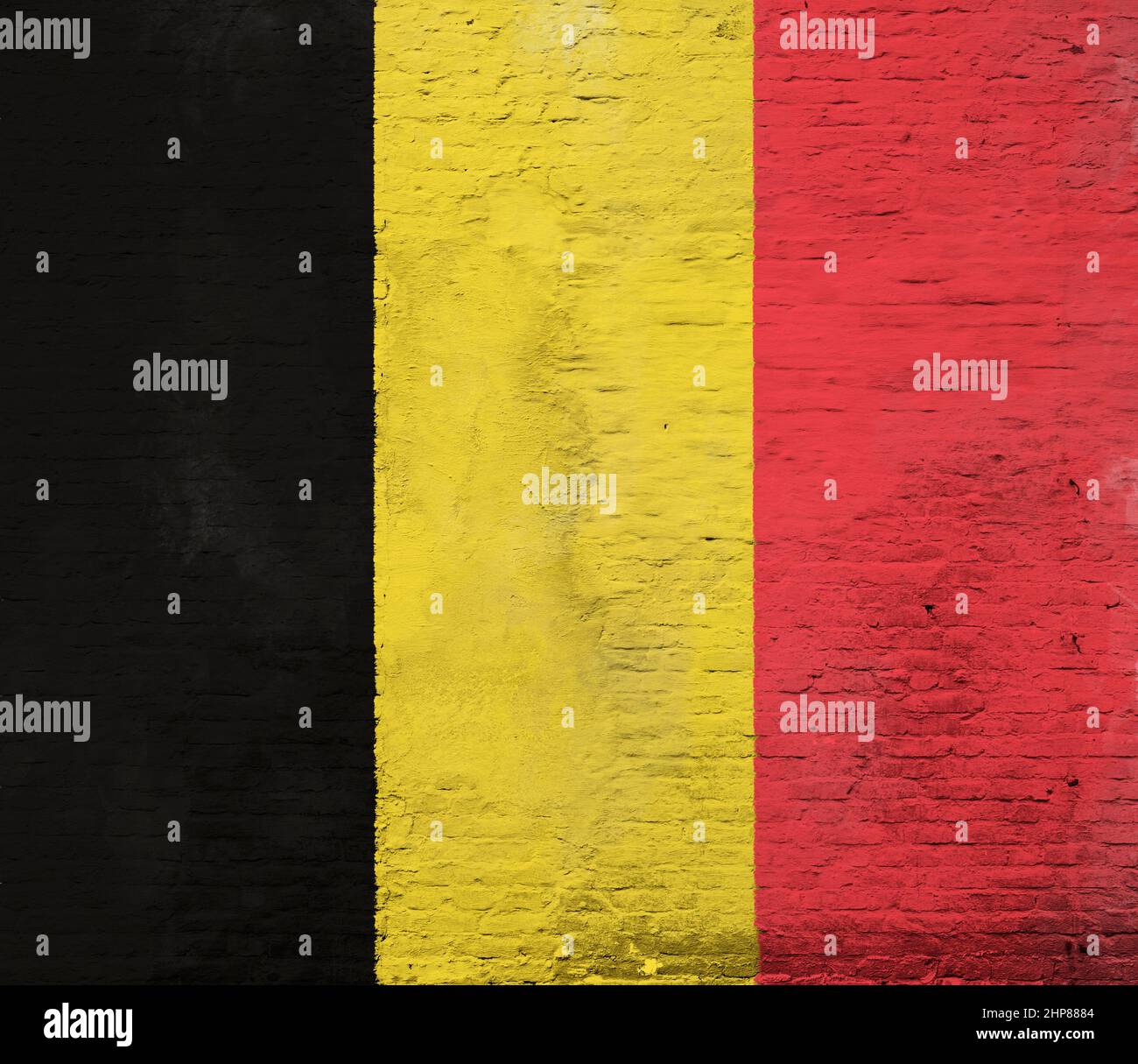 Full frame photo of a weathered flag of Belgium painted on a plastered ...
