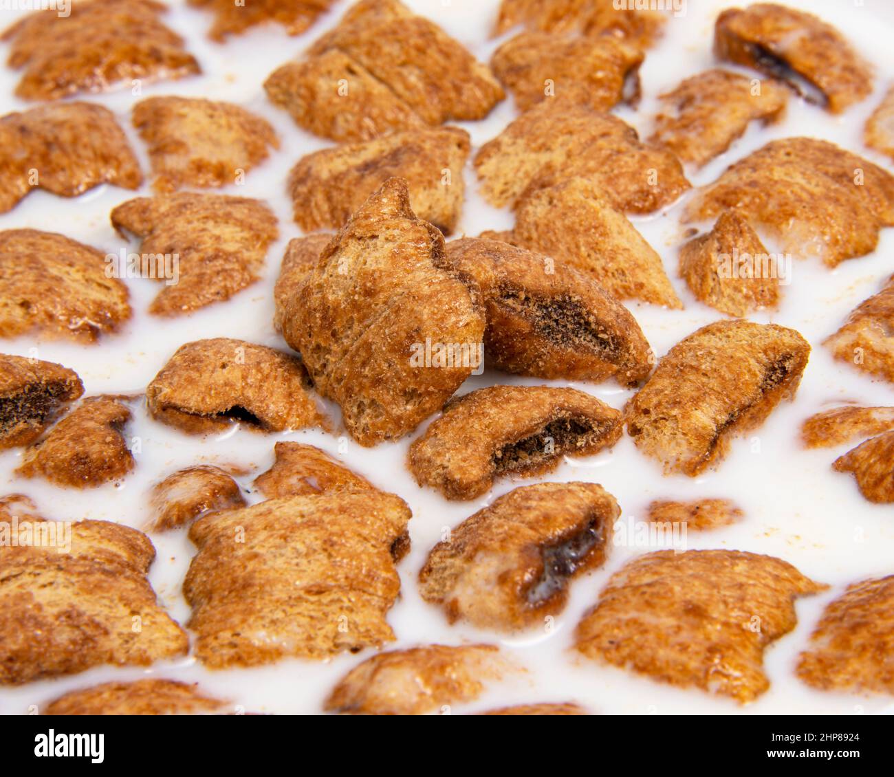 Crispy pads chocolate pillows with milk macro background Stock Photo ...