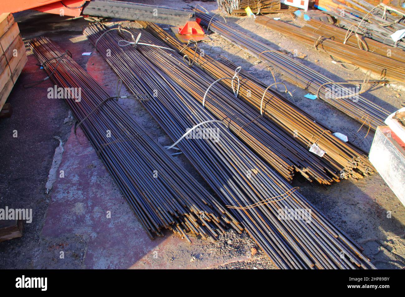Structural steel was unloaded at a construction site using a metal ...