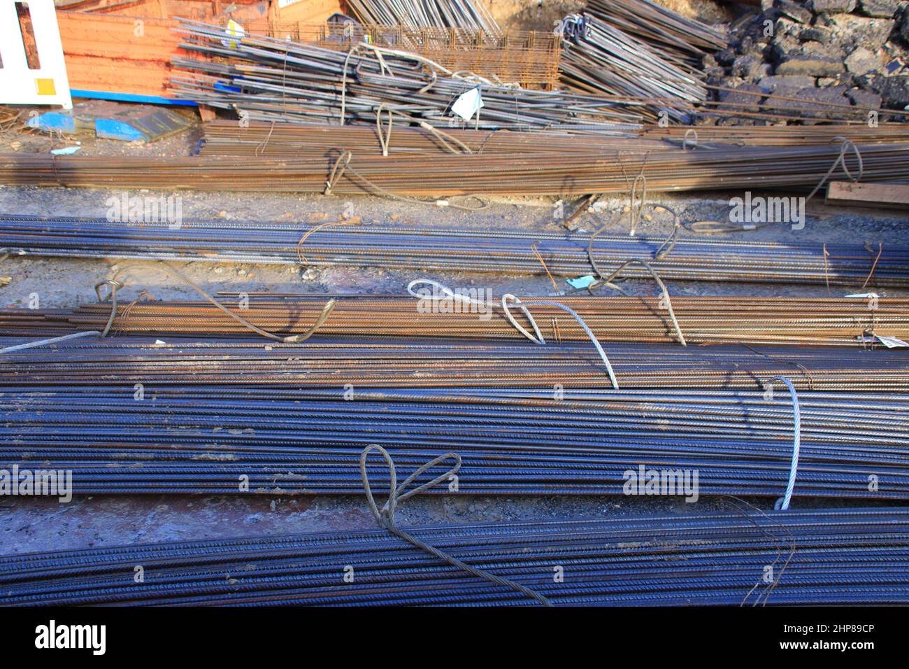 Structural steel was unloaded at a construction site using a metal ...