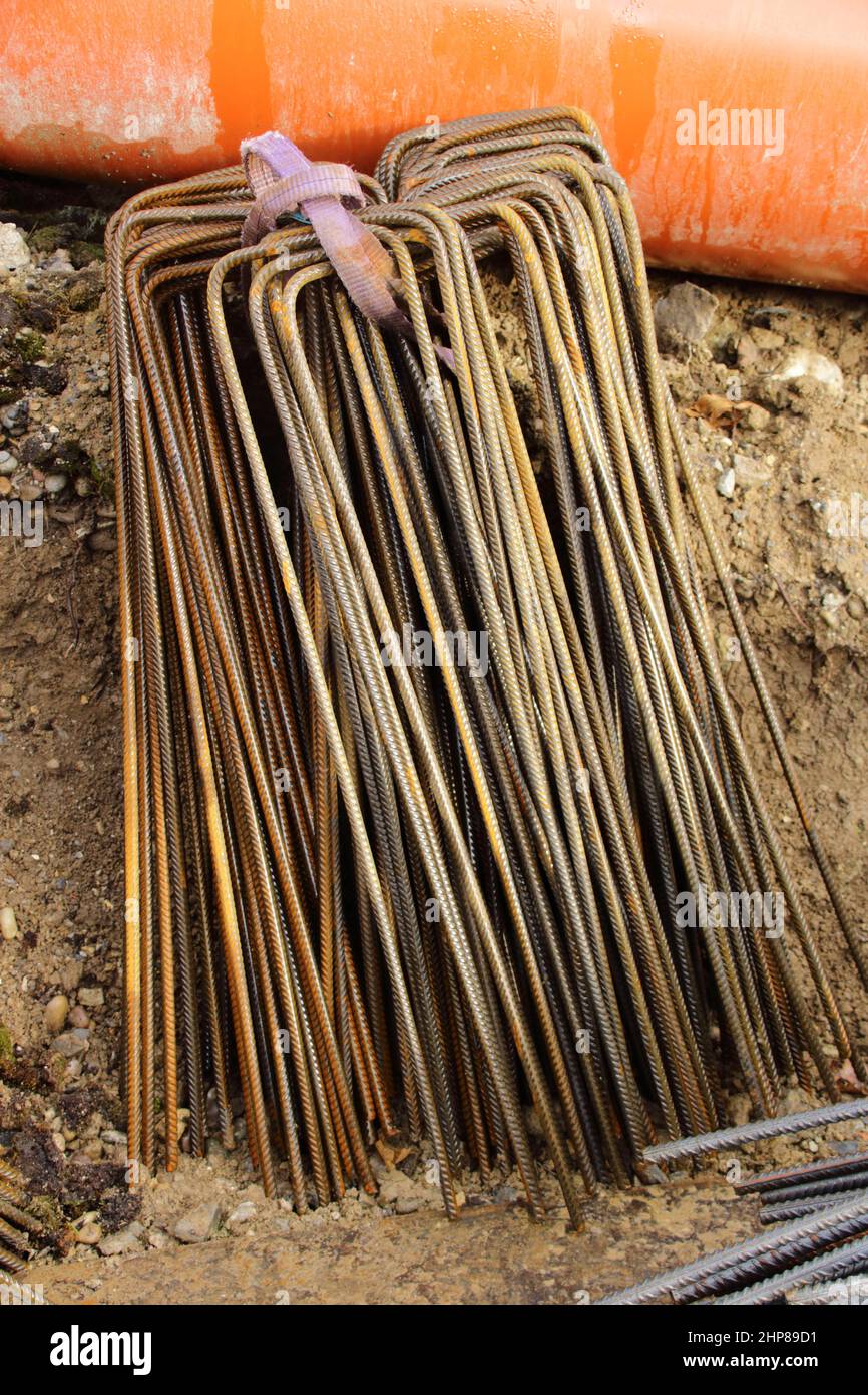 Structural steel was unloaded at a construction site using a lifting ...