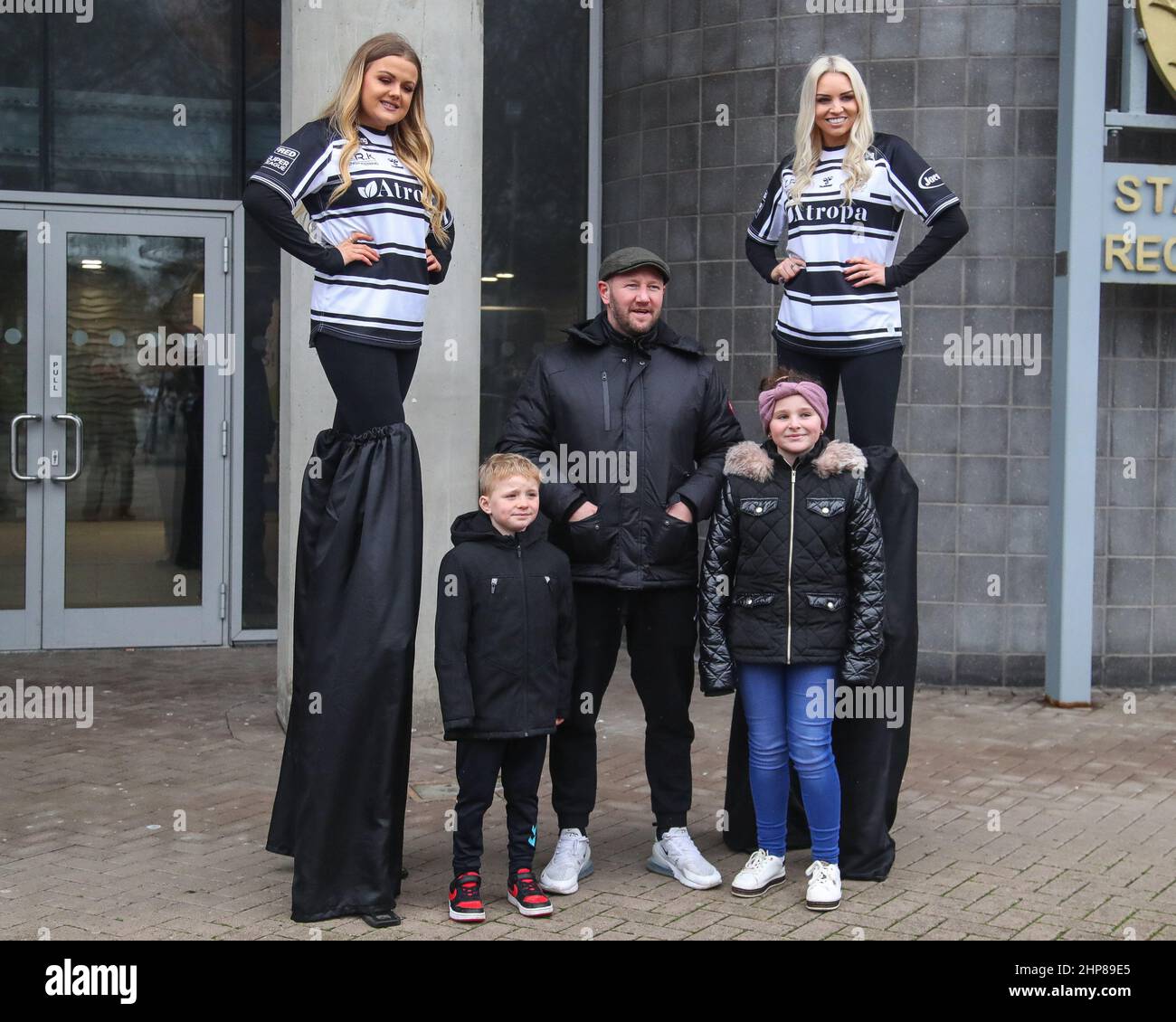 Hull FC fans have a photograph with 2 ladies on stilts in , on 2/19 ...