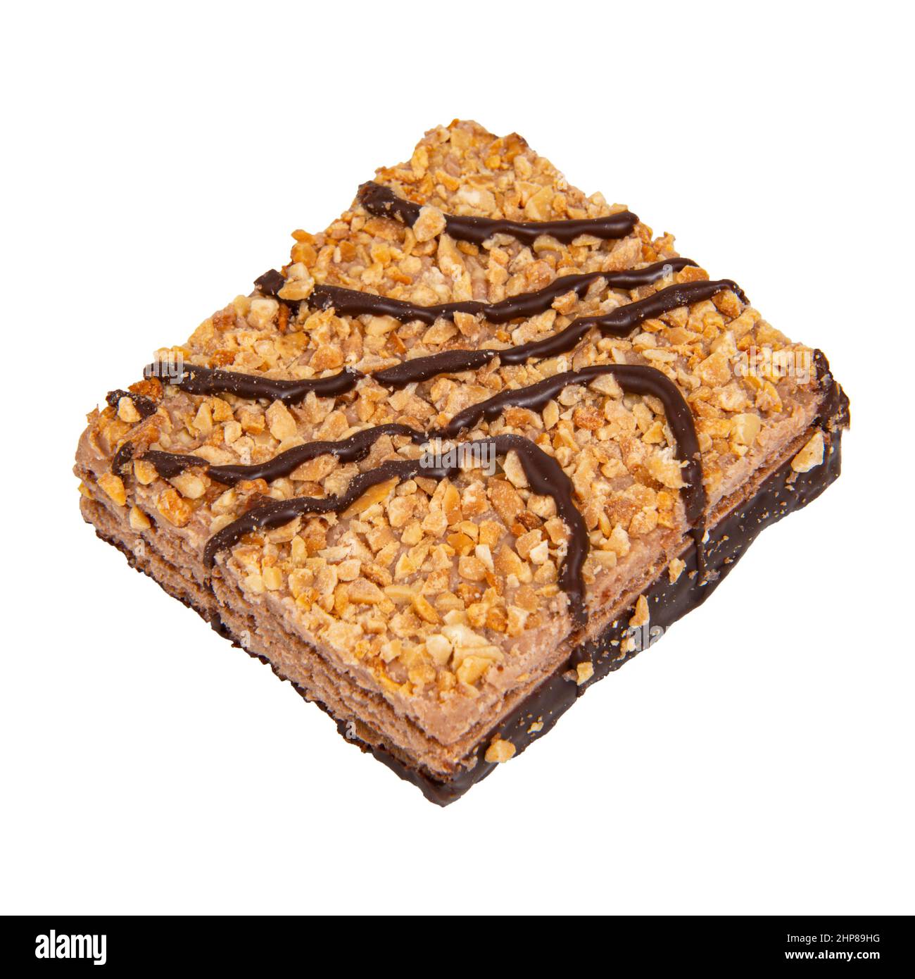 Tasty wafer with dropped nuts and chocolate isolated on the white ...
