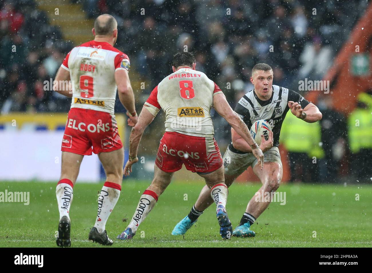 Jack Brown (20) of Hull FC looks to go past Alex Walmsley (8) of St ...