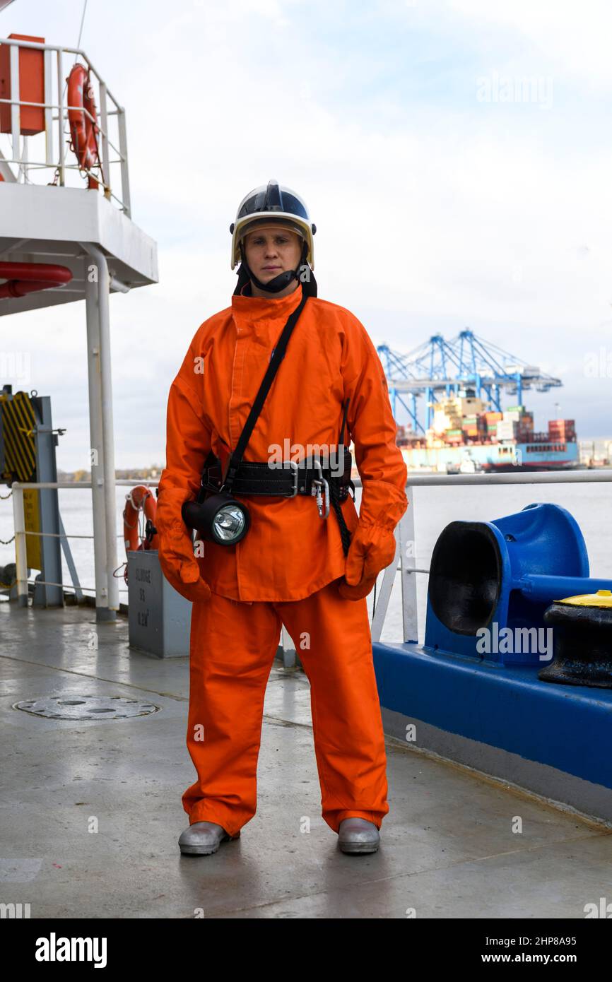 Fireman. Fire fighting equipment. Fire drill. Seaman with fire-fighter ...