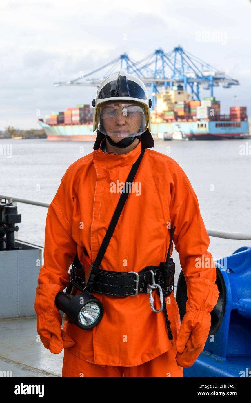 Fireman. Fire fighting equipment. Fire drill. Seaman with fire-fighter ...