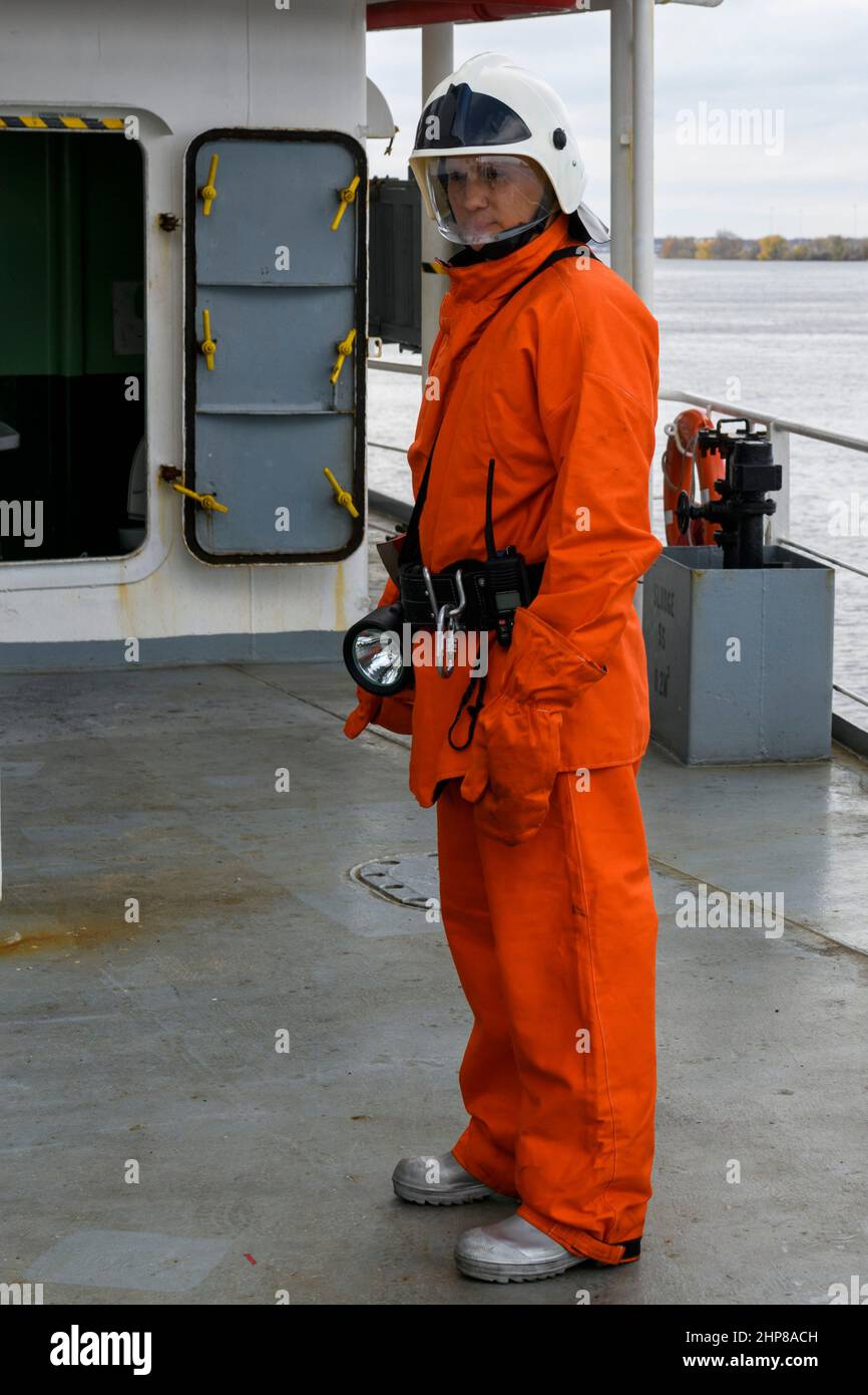 Fireman. Fire fighting equipment. Fire drill. Seaman with fire-fighter ...