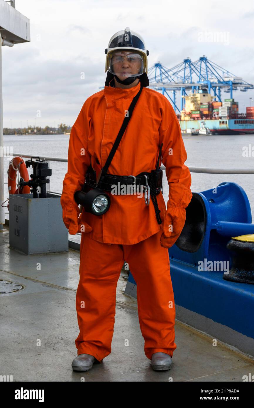 Fireman. Fire fighting equipment. Fire drill. Seaman with fire-fighter ...