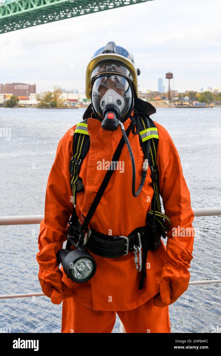 Fireman. Fire fighting equipment. Fire drill. Seaman with fire-fighter ...