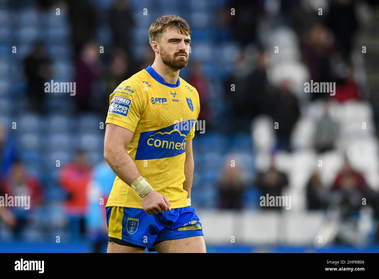 Tom Garratt #26 of Hull KR walks over to the fans after seeing his team ...