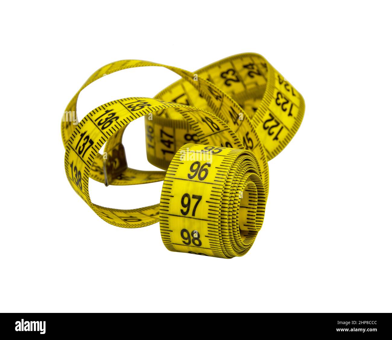 Yellow tape measure isolated on the white background Stock Photo - Alamy