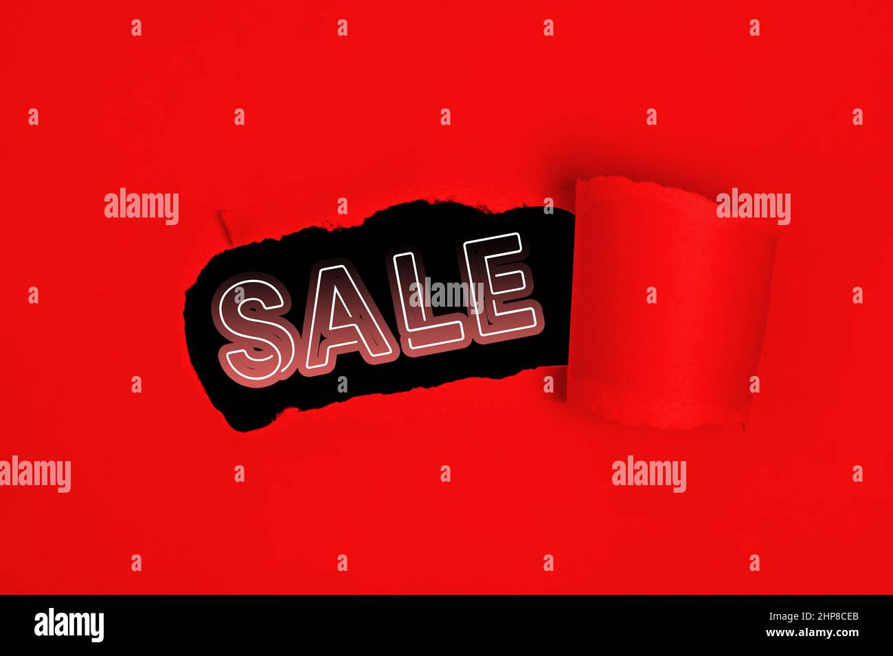 Red torn paper whole with sale text promo Stock Photo - Alamy