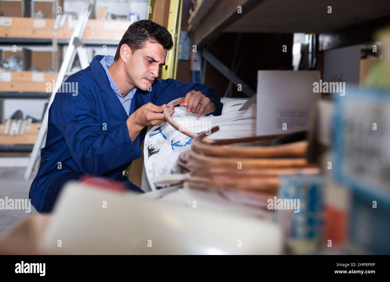 Shop assistant man checking hi-res stock photography and images - Alamy