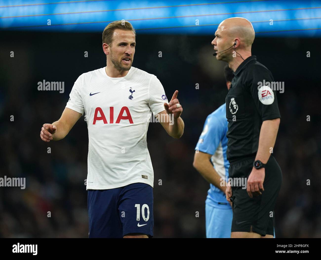 Tottenham Hotspur's Harry Kane (left) speaks with referee Anthony ...